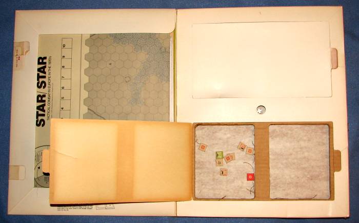 The maps and rules fit into a folder on the left, and there were two ...